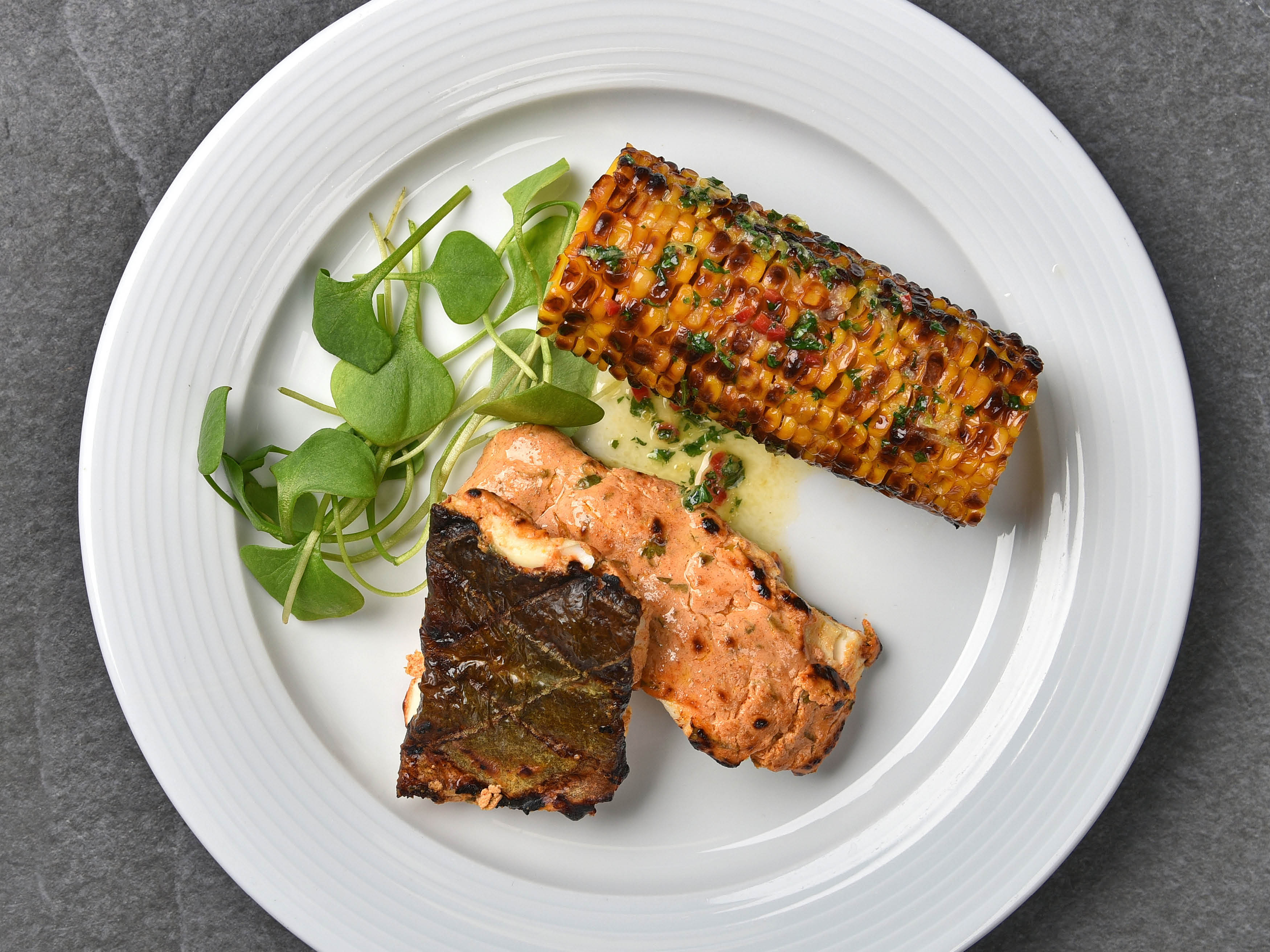 Tandoori-marinated Nutaaq® cod with chili/lime corn cobs - Royal ...