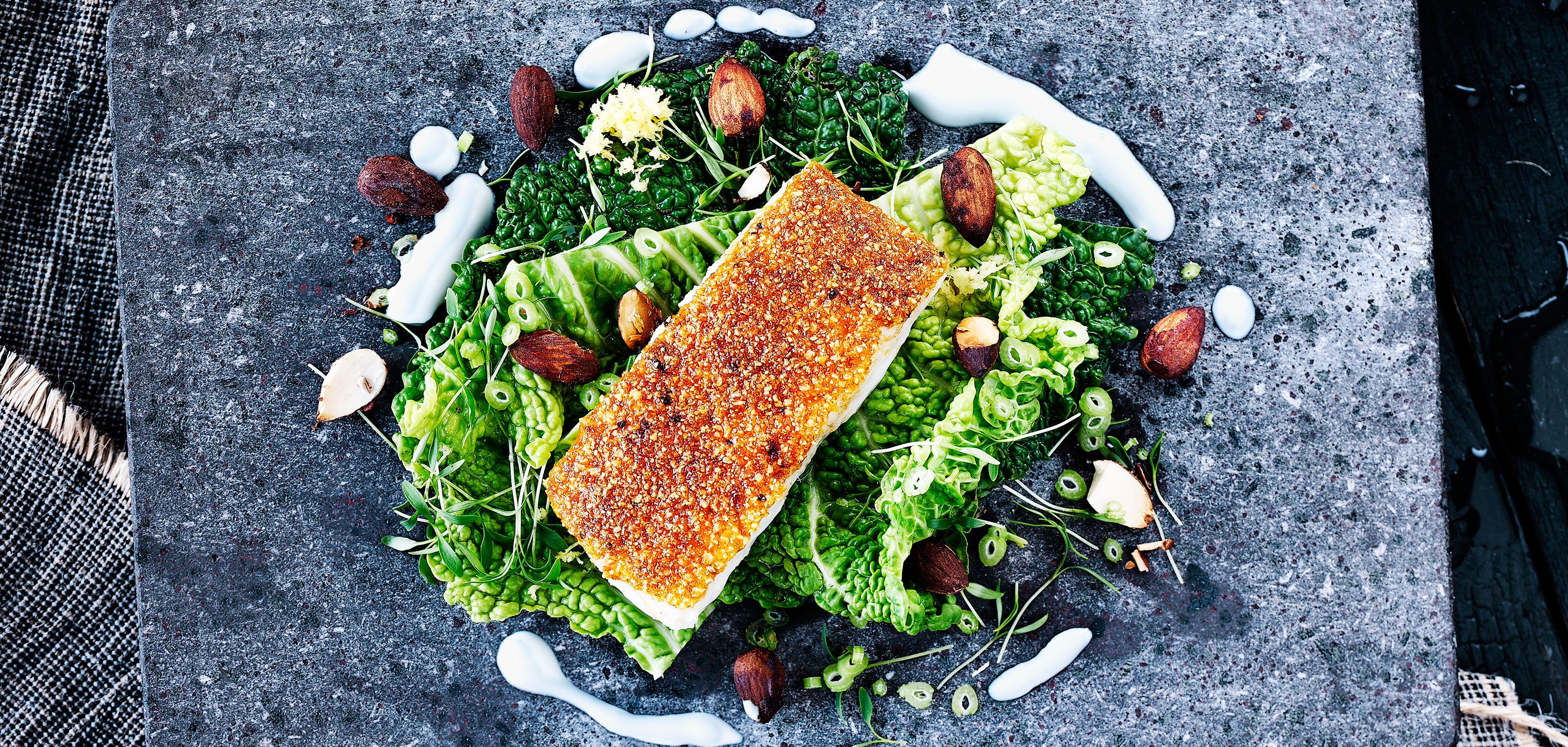 Barbecued cod with green Milan cabbage and almonds - Royal Greenland A/S