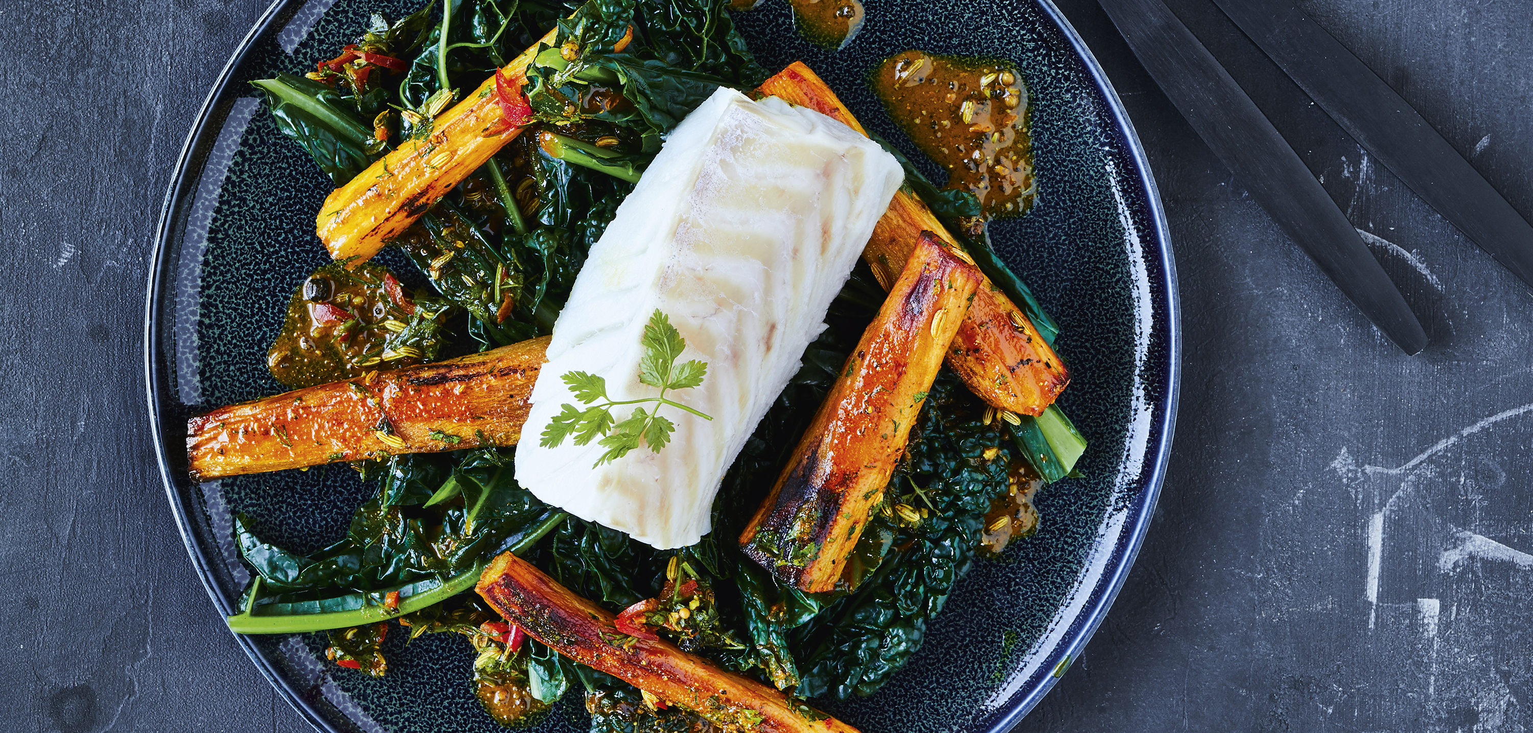 Steamed cod on palm cabbage and baked salsify roots - Royal Greenland A/S
