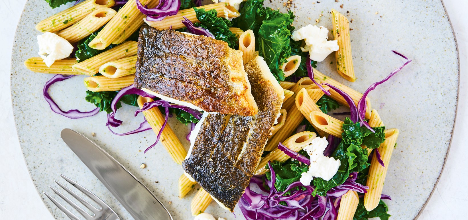 Crispy skin-fried cod with wholewheat penne pasta and two kinds of ...